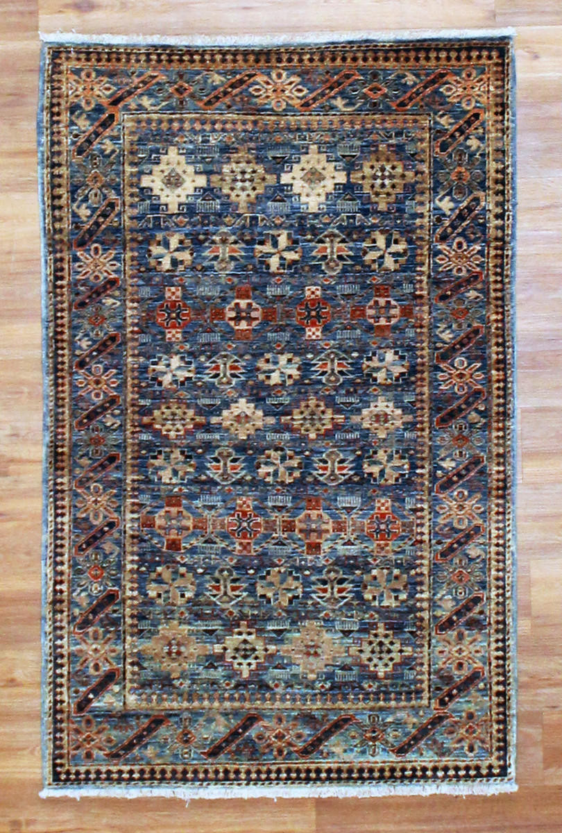 Blue background Afghan rug 3'1 x 4'10