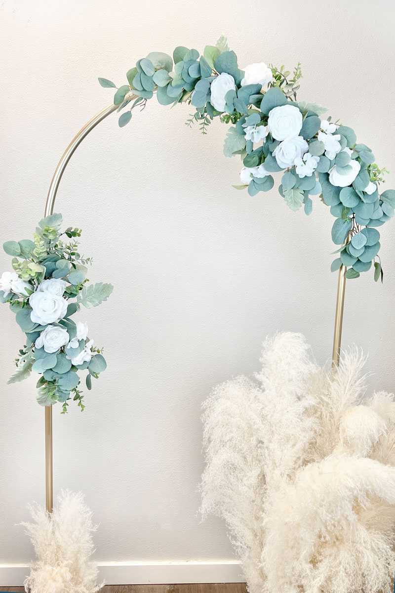 How to decorate a wedding arch with fake flowers | Beachweddingtips.com