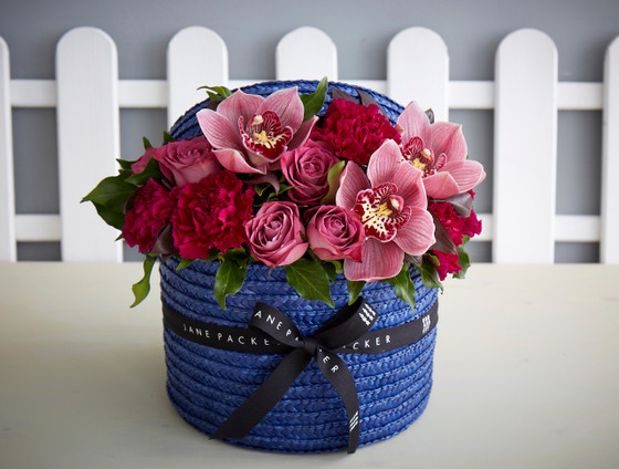 Slushie dark blue hatbox pink roses pink orchids | Jane Packer