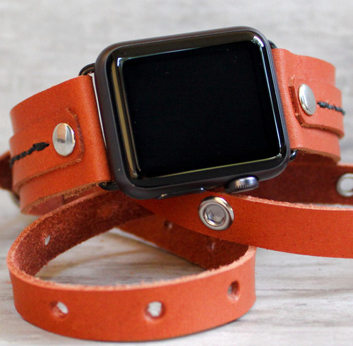 Orange leather wrap around band with silver embellishment