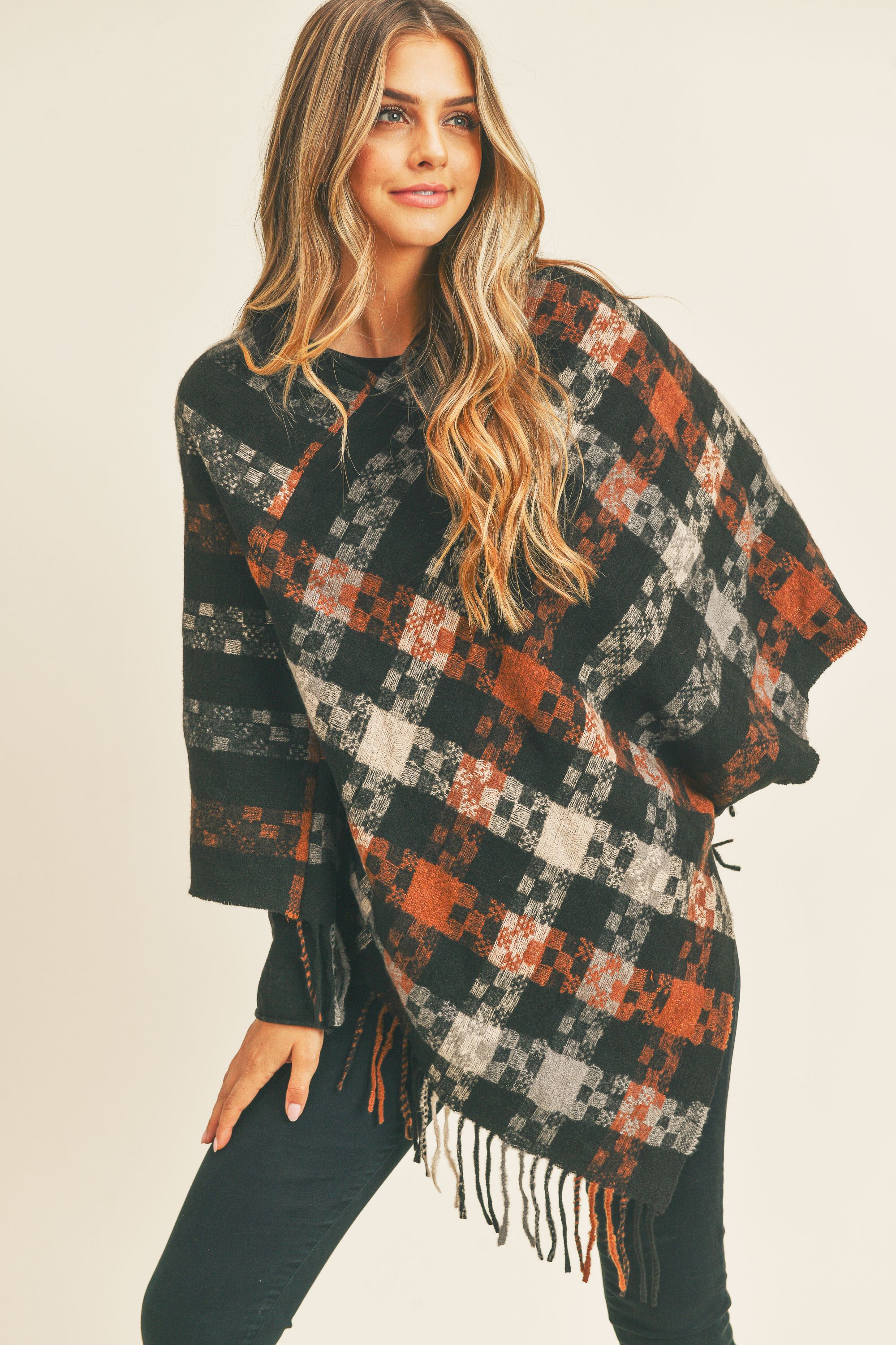 Poncho & Turtlenecks are perfect for chilly cold weather - Four Seasons