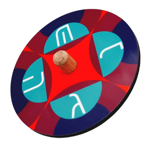 Hanukkah dreidel with Hebrew writing made from wood-round multicolored