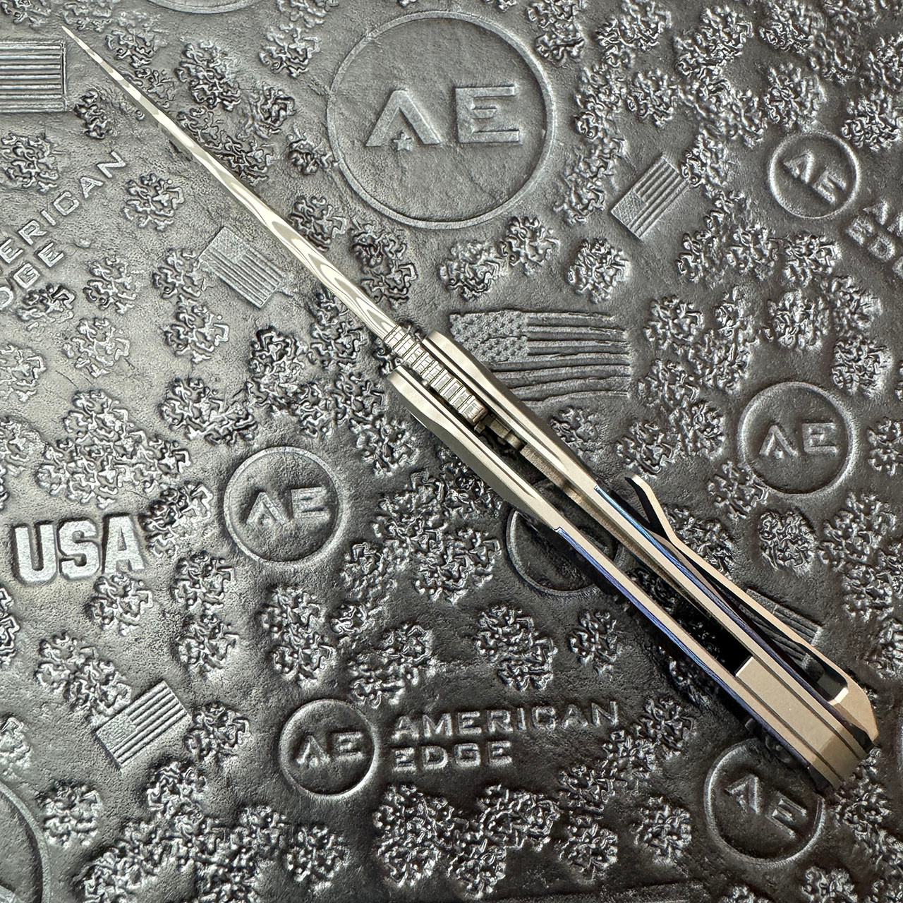 Vero Engineering Synapse Frame Lock Timascus Handle Damasteel Blade ...