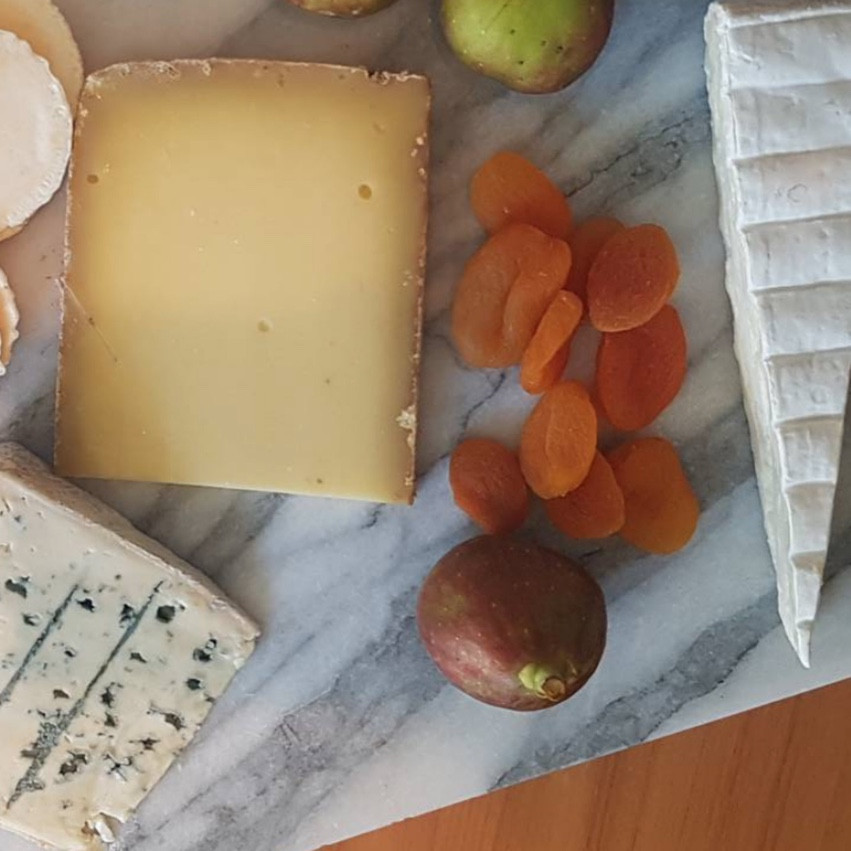 Cheese Wheel Tower | Le Fromage Yard
