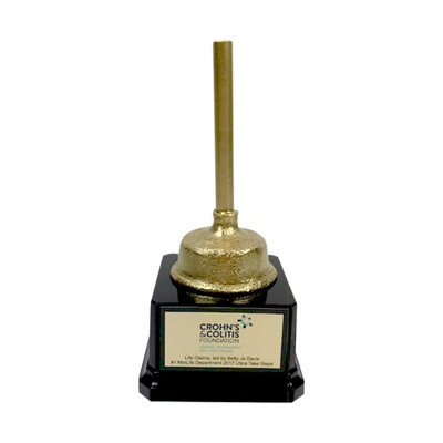 Golden Plunger Trophy - Far Out Awards