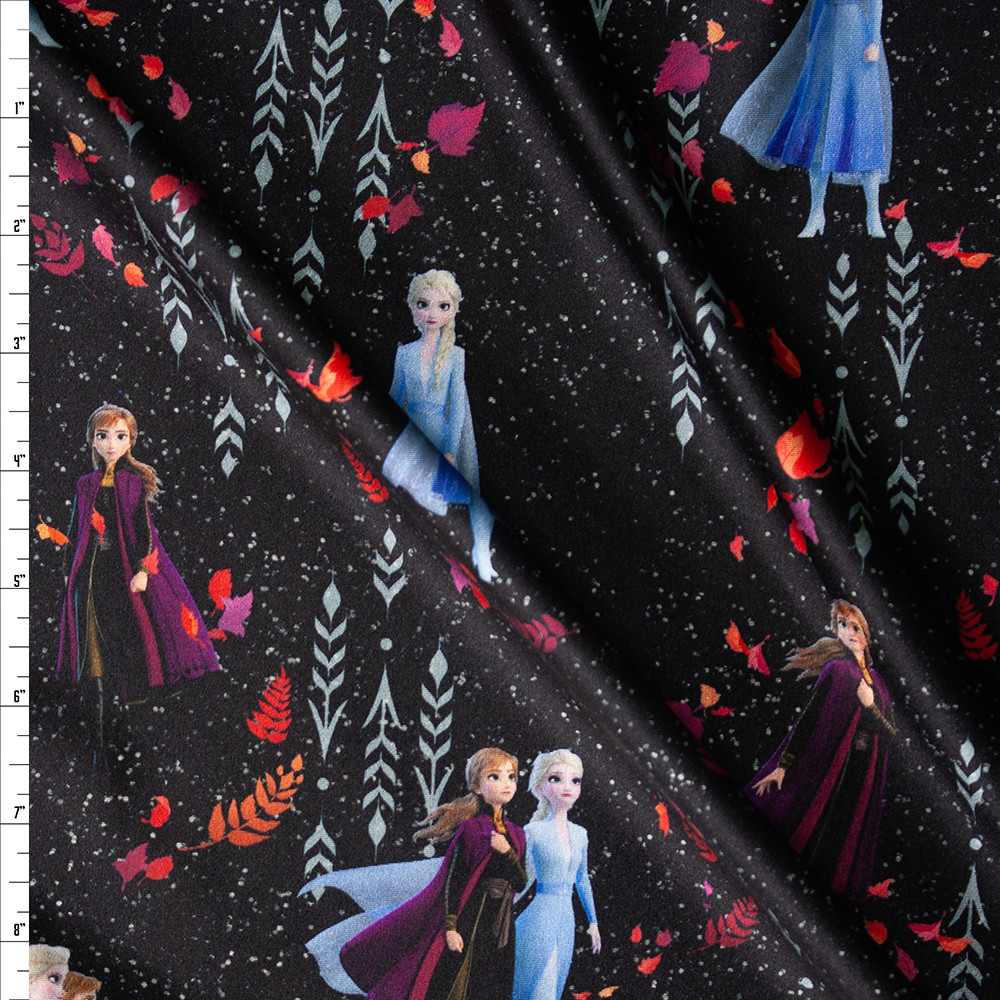 Cali Fabrics Anna and Elsa on Black Nylon/Spandex Fabric by the Yard