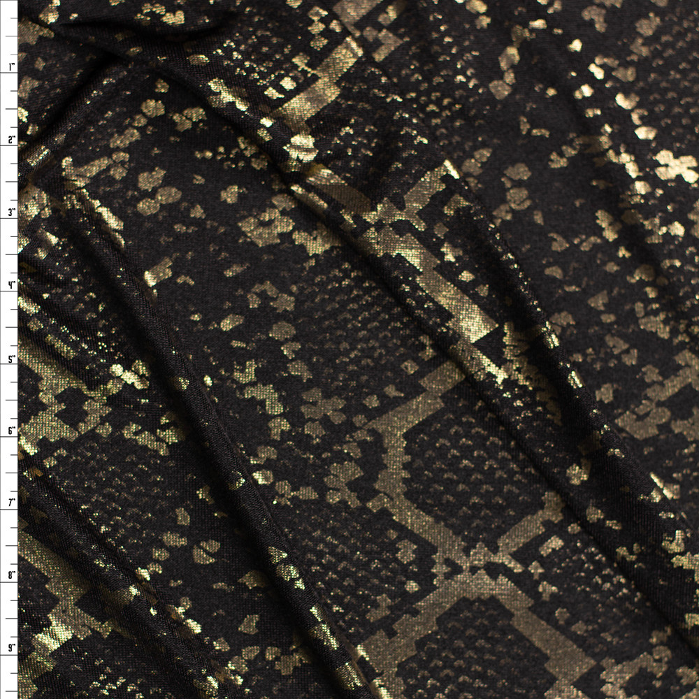 Cali Fabrics Gold Snakeskin on Black Sheer Poly Knit Fabric by the Yard