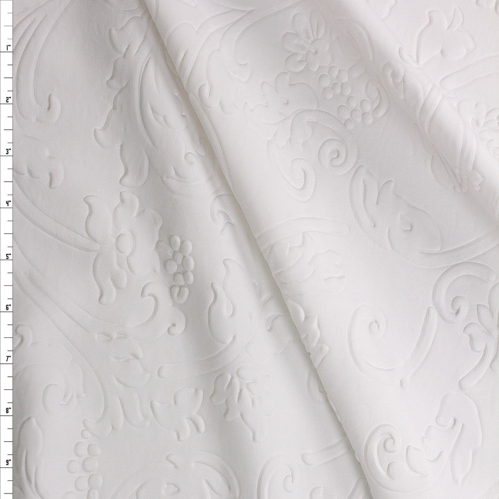 Cali Fabrics White Embossed Floral Scuba Knit Fabric by the Yard