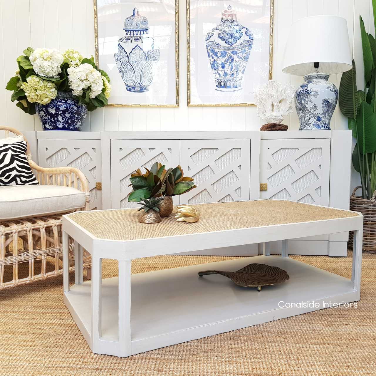 The Brielle Rattan Rectangular Coffee Table Distressed Stone Natural Rattan Coastal Elegance Canalside Interiors