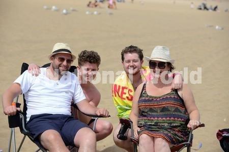 39505809-High summer temperatures at Sandhaven Beach. Jen and Chris ...