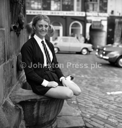 20235008-british actress Polly James dressed as a schoolgirl with ...