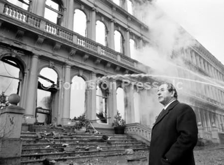 20243910-Firemen continue to damp down the building after the fire at ...