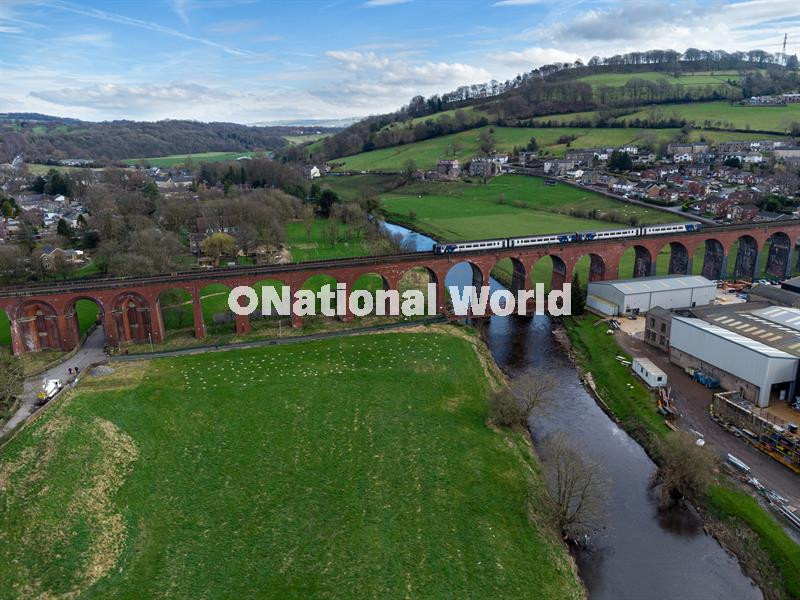 39937219-A train travels across Whalley Viaduct in Lancashire. Photo ...