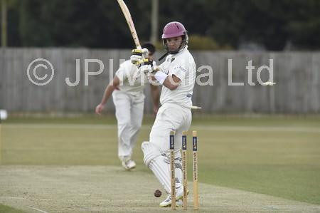 38967533-Peterborough Town v Brigstock cricket action at Bretton Gate ...