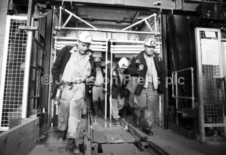 20386043-Coal miners leave the cage at the Castlebridge shaft of ...