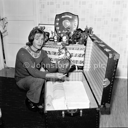 20234824-Edinburgh boxer Bobby Mitchell with boxing awards, medals and ...