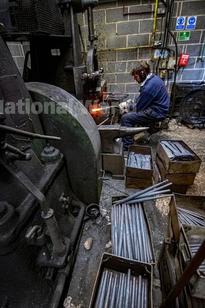 39574920-27 September 2022. . . . . Forge manager Nick Adams working at ...