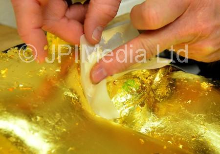 39042694-Gilder Nigel Searle applying Gold Leaf. Picture by FRANK REID ...