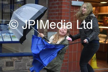 38543754-Photo Neil Cross Wet weather Brolly good fun in the wind and rain - National World ...