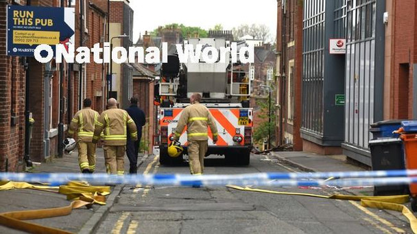 39707214-Fire fighters remain at the scene of last night s fire on ...
