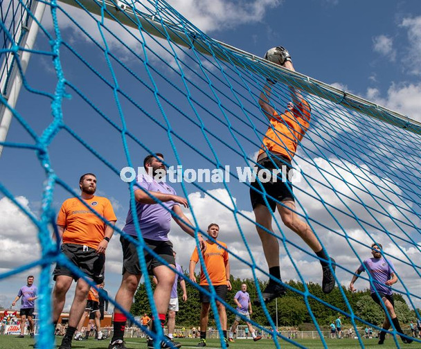 39825958-Pictured: Action from the tournament. Family and friends of ...