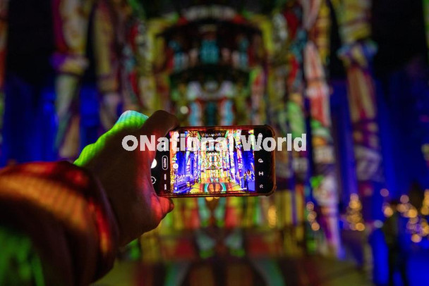 39903503-A visitor photographs the illuminations at Sheffield ...