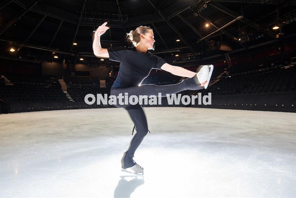 39916448-Ice skating coach Oscar Peter with student Miranda Green in ...