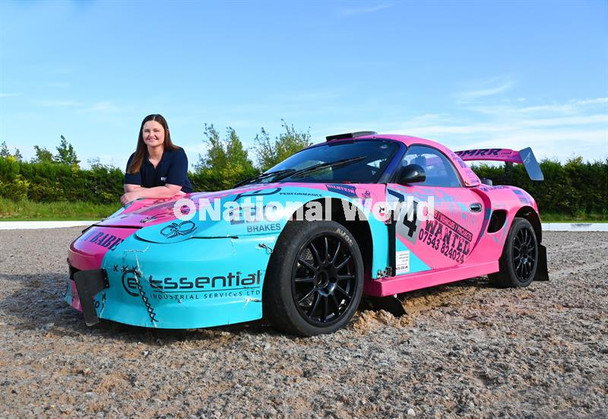 39997055-Racing driver Michelle Swallow with the brightly coloured ...