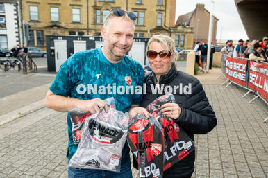 40364741-Morecambe FC fans with the new home shirt which the kit ...