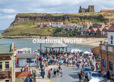 40366016-The Whitby Tiller Men perform at the bandstand as part of ...