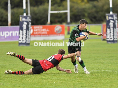 40383791-Simon White of Carrick gets a grip on City of Derry’s Andrew ...