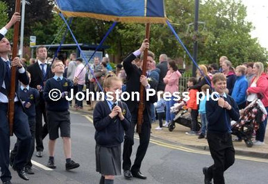 37835296-Photo: David Hurst Holy Trinity banner carriers at the ...