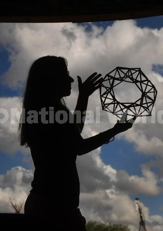 39553536-Anna Airaksinen is pictured with her Himmeli Mobiles she makes ...