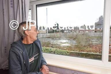 39353467-Residents are protesting against plans to build flats on the ...
