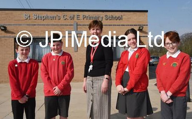 39387096-WIGAN LEIGH 23-03-22 Headteacher Jill Southern with pupils at ...