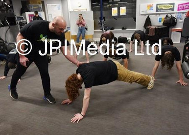 39329188-WIGAN - 20-01-22 Former rugby league player Jamie Acton leads ...