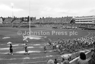 20384751-The Scottish team circuit the track in the opening ceremony of ...