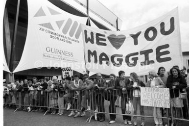 20385177-A pro-Thatcher crowd with a WE LOVE YOU MAGGIE banner waits to ...