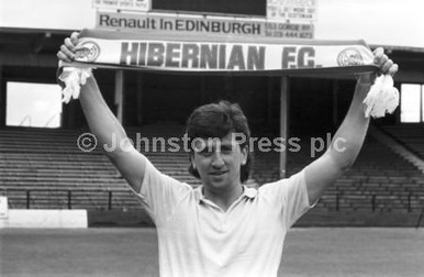 20385796-George McCluskey signs to Hibs football team in August 1986 ...