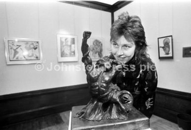 20386297-Art teacher Carol Taylor beside a bronze centaur sculpted by a ...