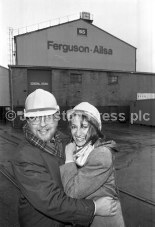 20386336-Australian publisher Greg Copley and his wife celebrate buying ...