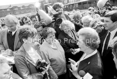 22644163-The Press surge forward as Prime Minister Margaret Thatcher ...