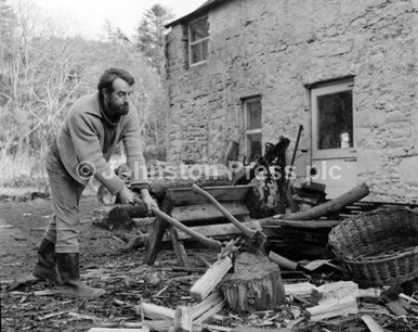 23444513-Isle of Arran - Mr Gilbert chops wood for fire Picture taken ...