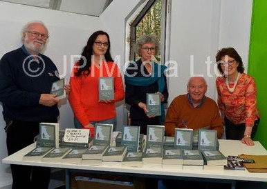 39432560-Author Sam Burnside signs a copy of his book My Name is ...