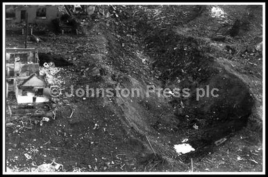 22657704-Aerial of the crater left by the wreckage of the Pan Am flight ...