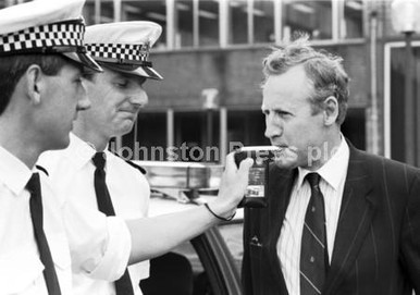 22665996-Two members of Lothian and Borders police demonstrate a ...