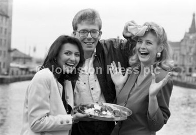 22702039-TV presenters Lisa Aziz and right Ulrika Jonsson with Charlie ...