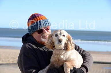 39356847-Out and about at Blyth Beach. Chris Maltby with his dog Floki ...