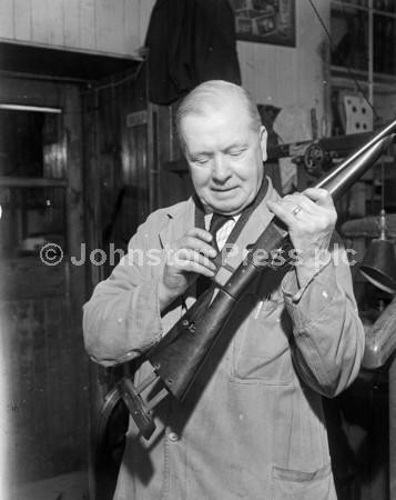 20863322-Edinburgh gunsmith with a rifle - National World | Newsprints