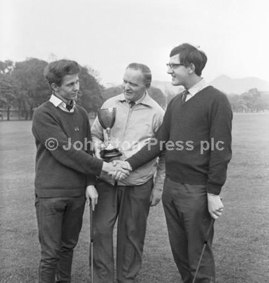23443261-P. . . Gilzean left receives the Edinburgh Corporation Golf ...